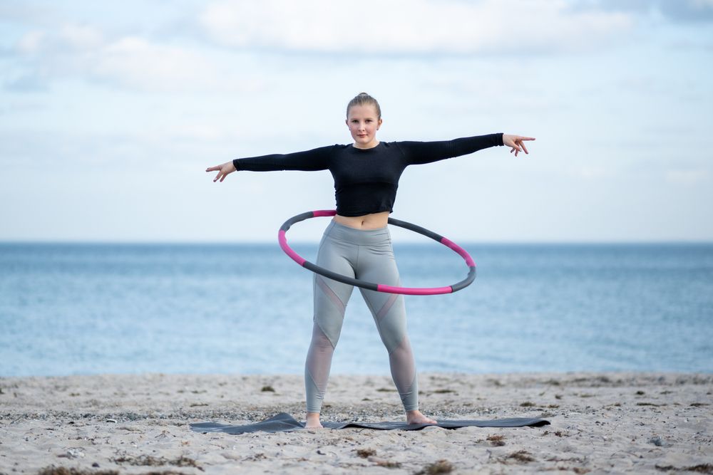 4 Fun Hula Hoop Exercises To Shrink Belly Fat